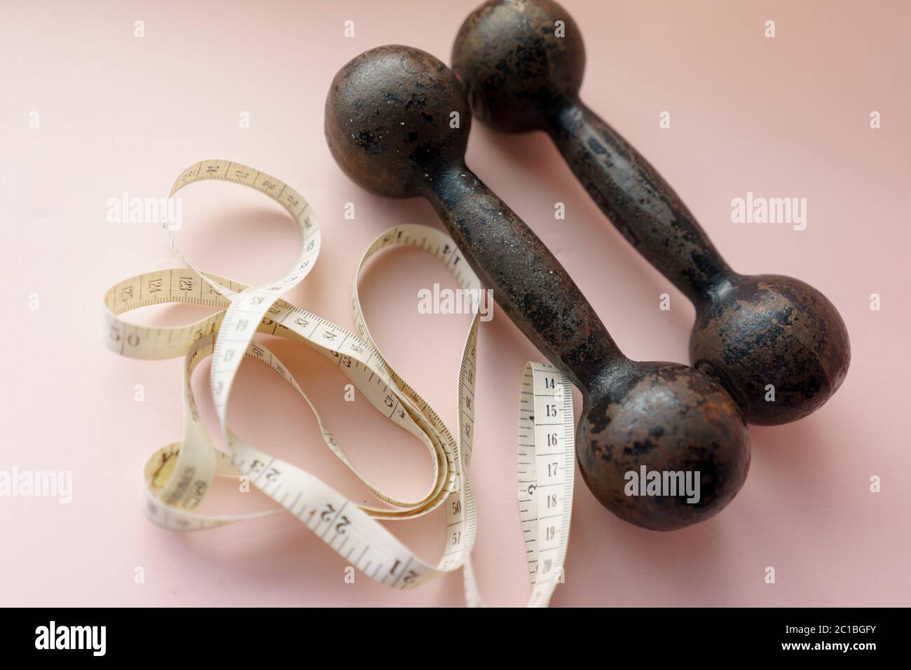 Dumbbells and Tape Measure, Fitness Concept Stock Photo - Alamy