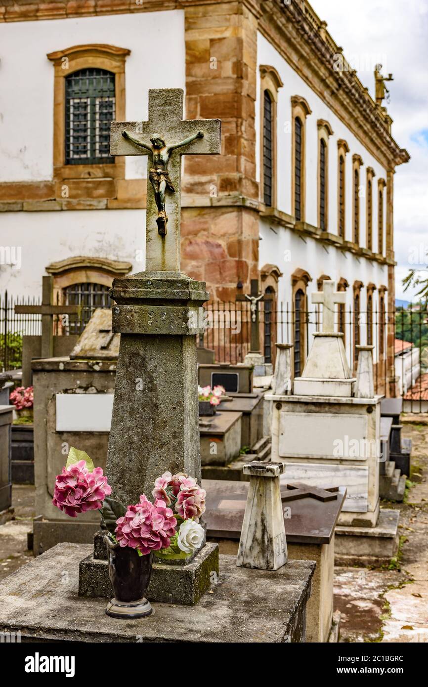 Ancient cemetery next to historic church Stock Photo - Alamy
