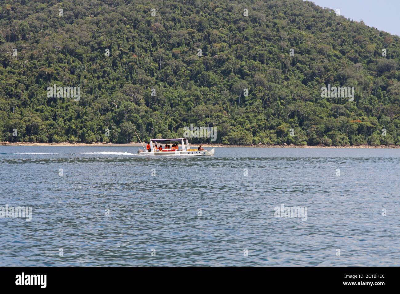 View of the Lokobe Strict Nature Reserve on Nosy Be Island and tourists ...