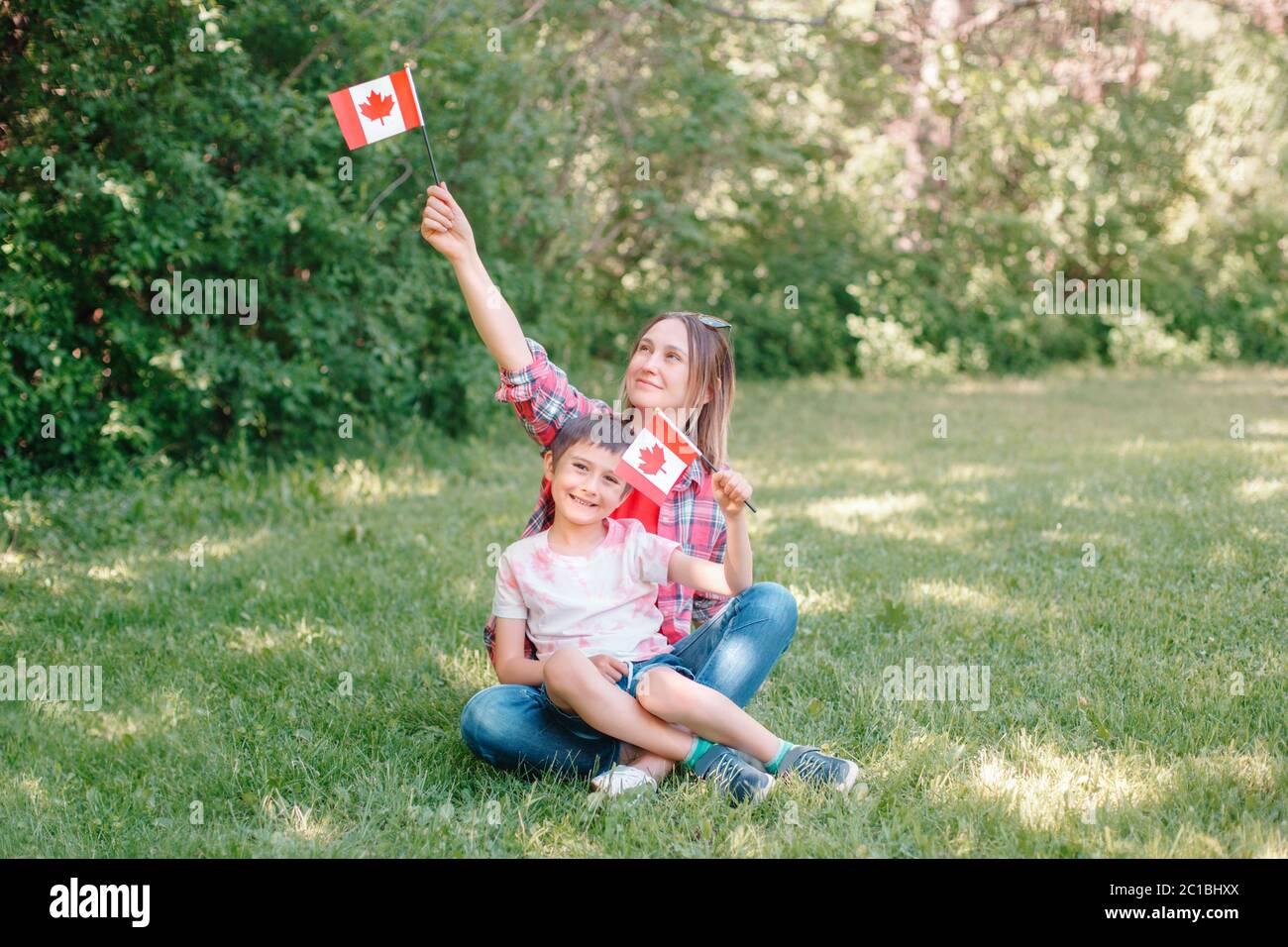 Family mom with son celebrating national Canada Day on 1st of July ...