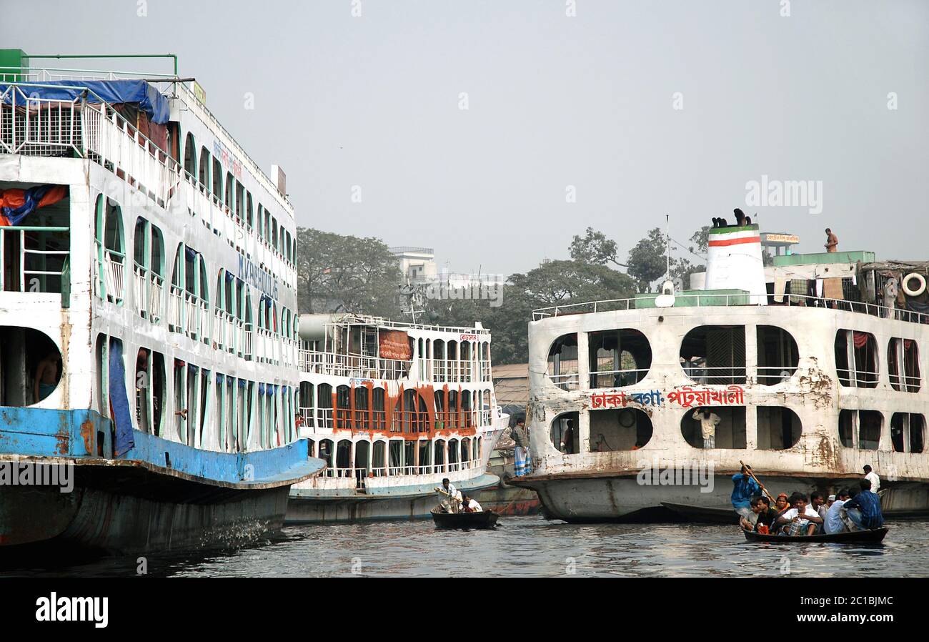 Large ferries and small boats at Sadarghat in Dhaka, Bangladesh Stock ...