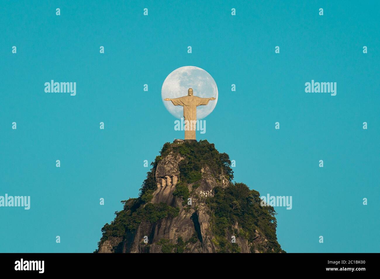 Christ the Redeemer Statue on top of the Corcovado mountain and the ...