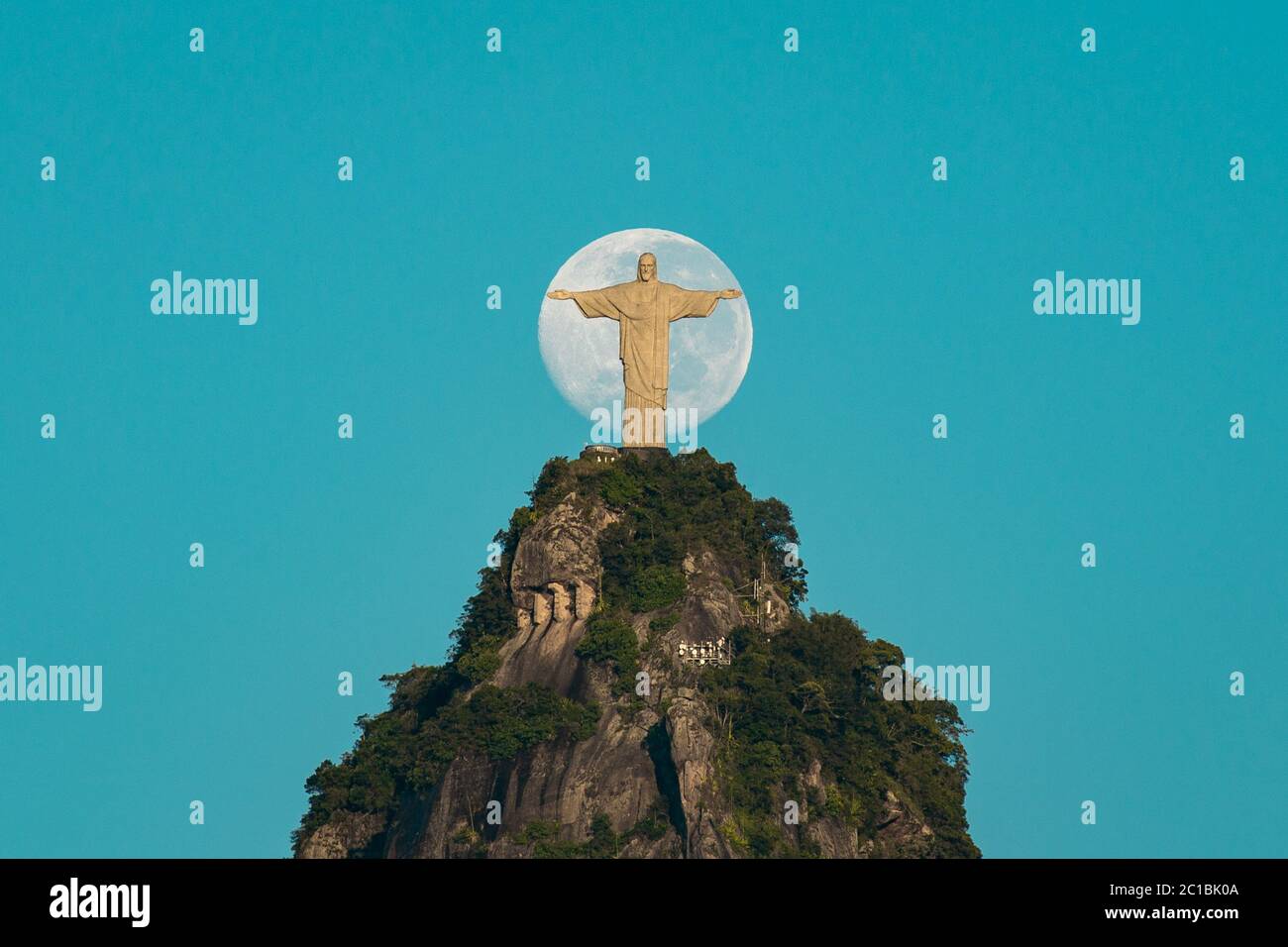 Statue christ full moon rio hi-res stock photography and images - Alamy