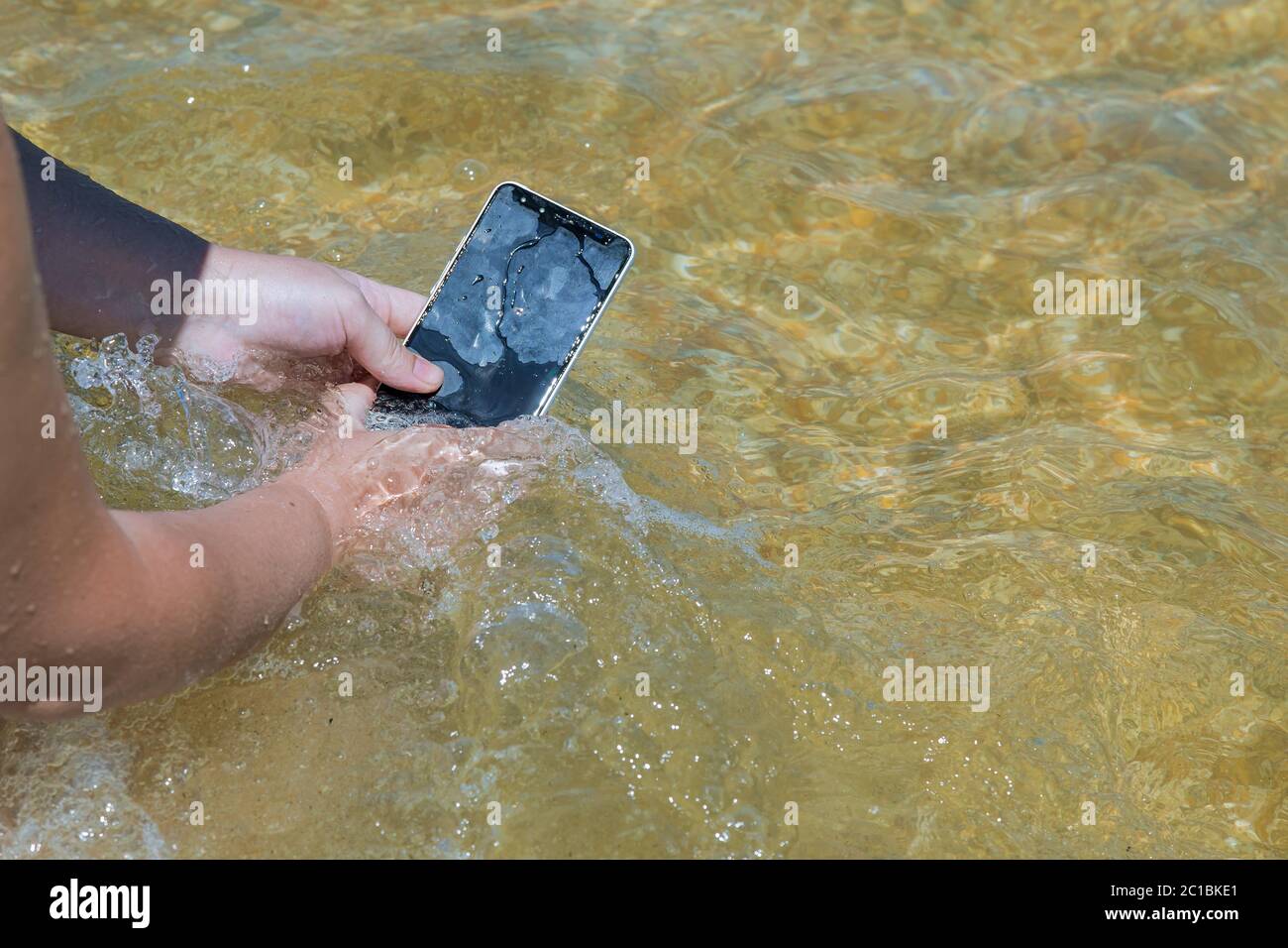Phone water splash hi-res stock photography and images - Alamy