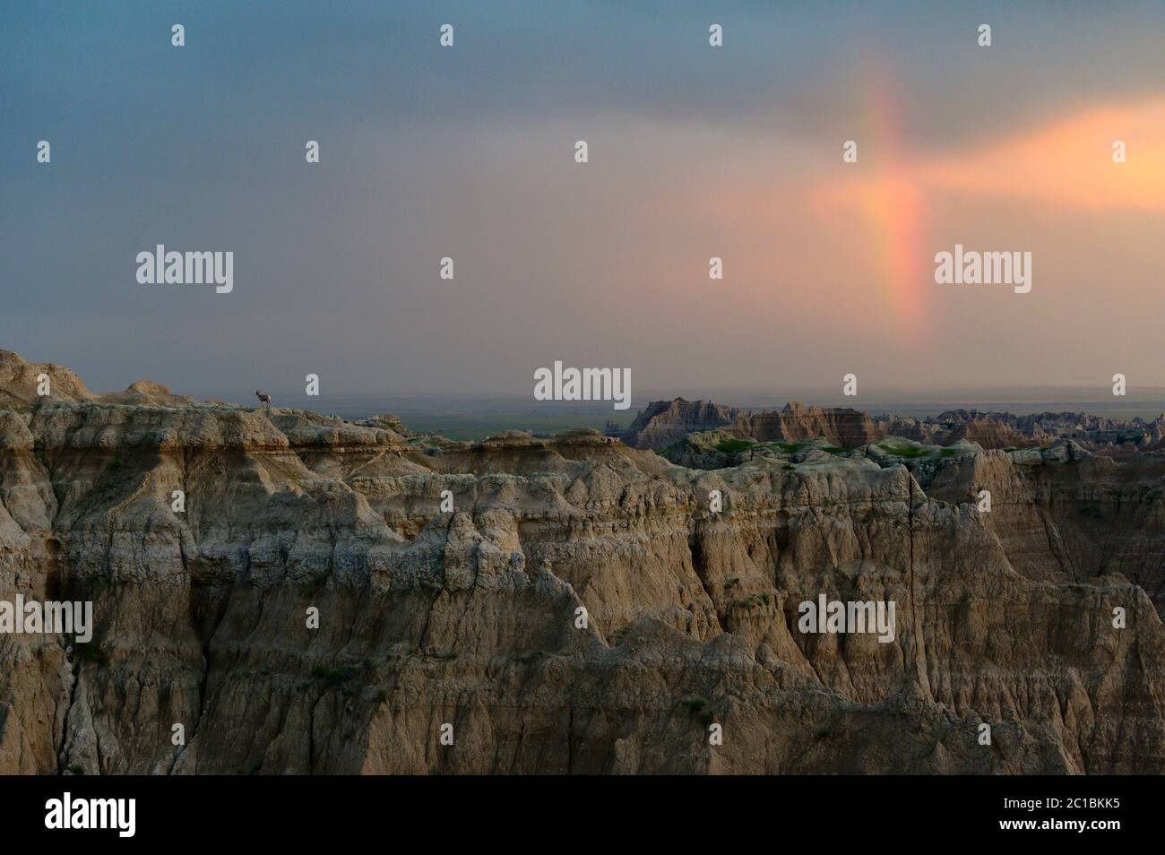 USA, South Dakota, Badlands National Park during summer thunderstorm ...