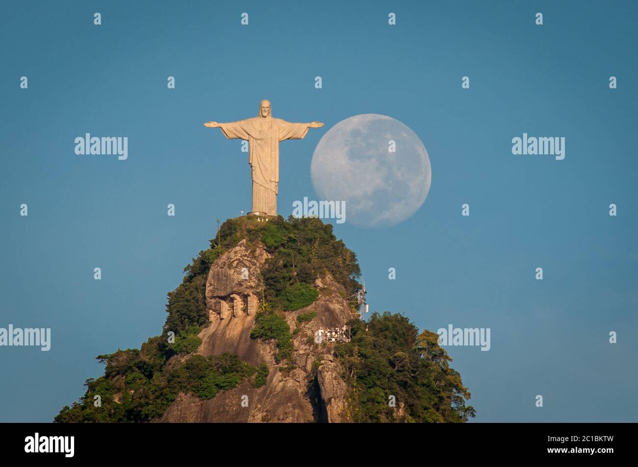 Christ the Redeemer Statue on top of the Corcovado mountain and the ...