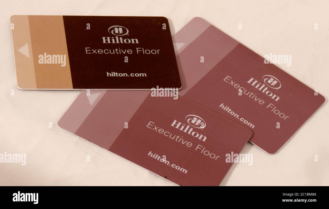 Three executive floor room cards for Hilton hotels Stock Photo - Alamy