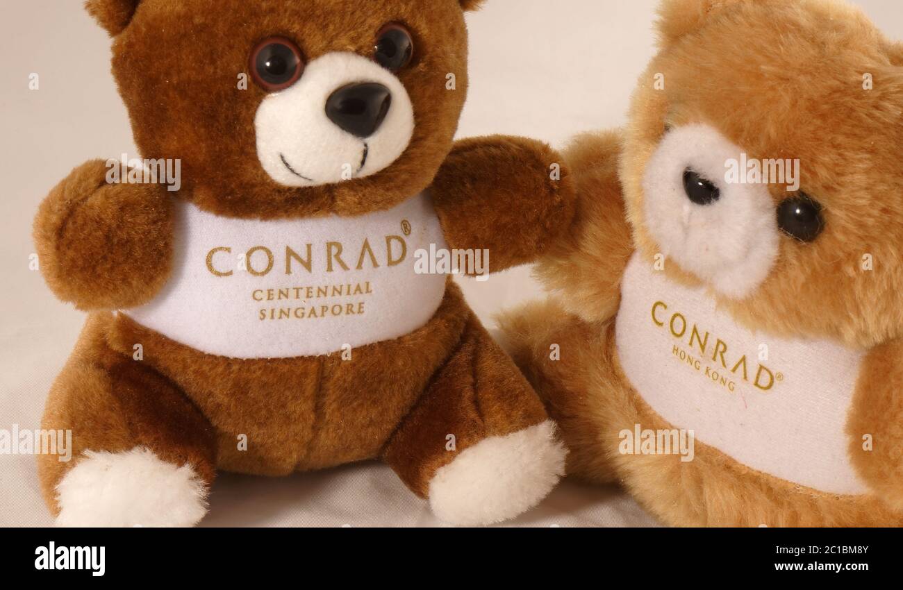 Two Conrad Hotel bears from Singapore and Hong Kong Stock Photo - Alamy