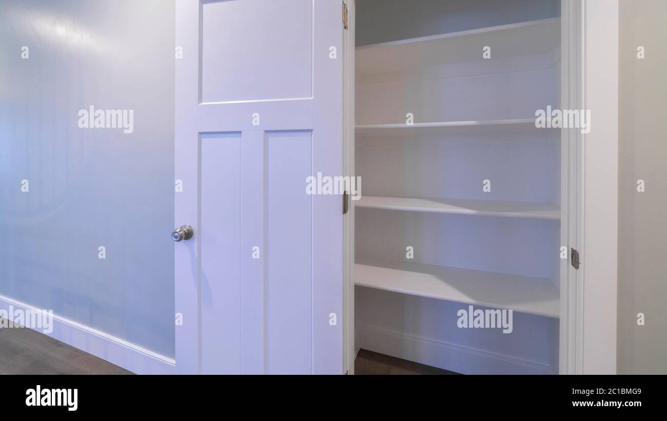 Panorama frame Open empty fitted cupboard or wardrobe interior Stock ...