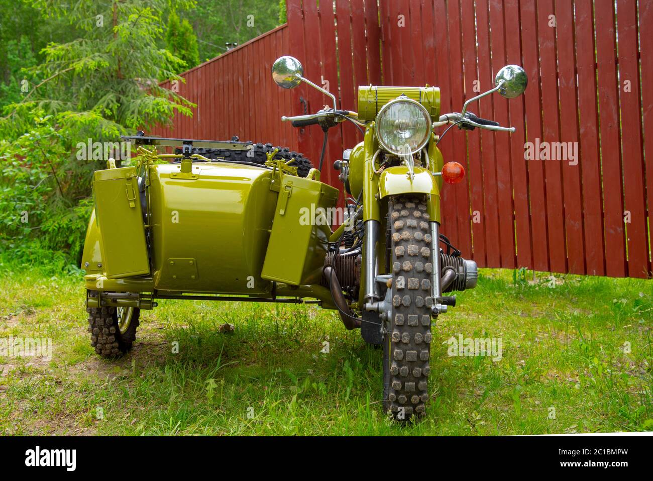 Restored bright green retro motorcycle with sidecar Stock Photo - Alamy