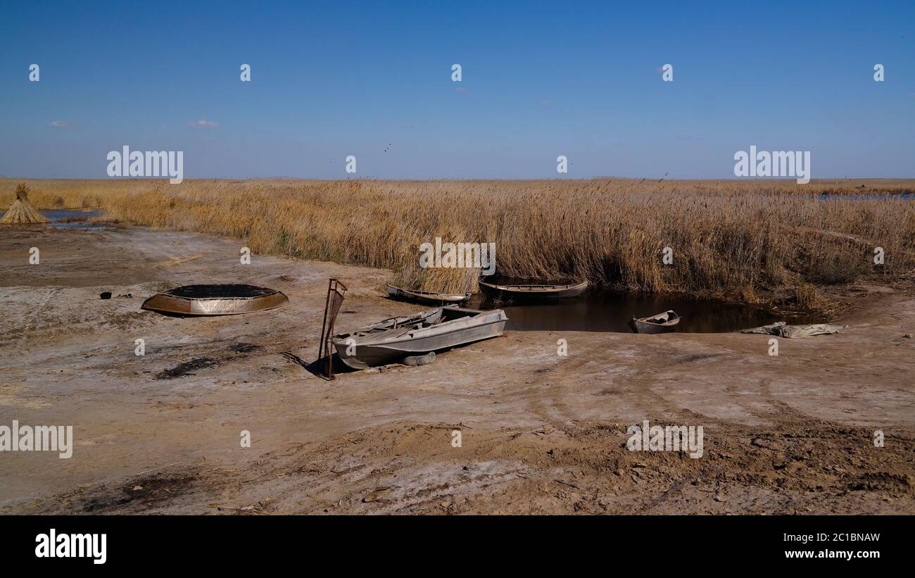 runed Urga fishing village at the shore of Sudochye lake aka part of ...