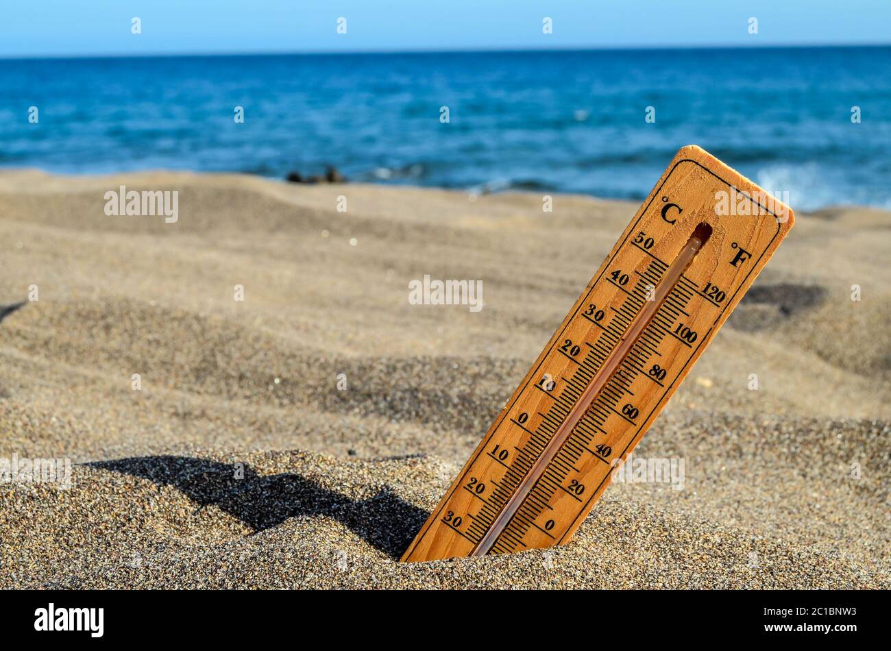 Thermometer on the Sand Beach Stock Photo - Alamy