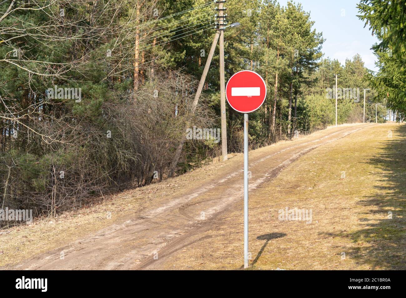 No entry sign in front of a forest path Stock Photo - Alamy
