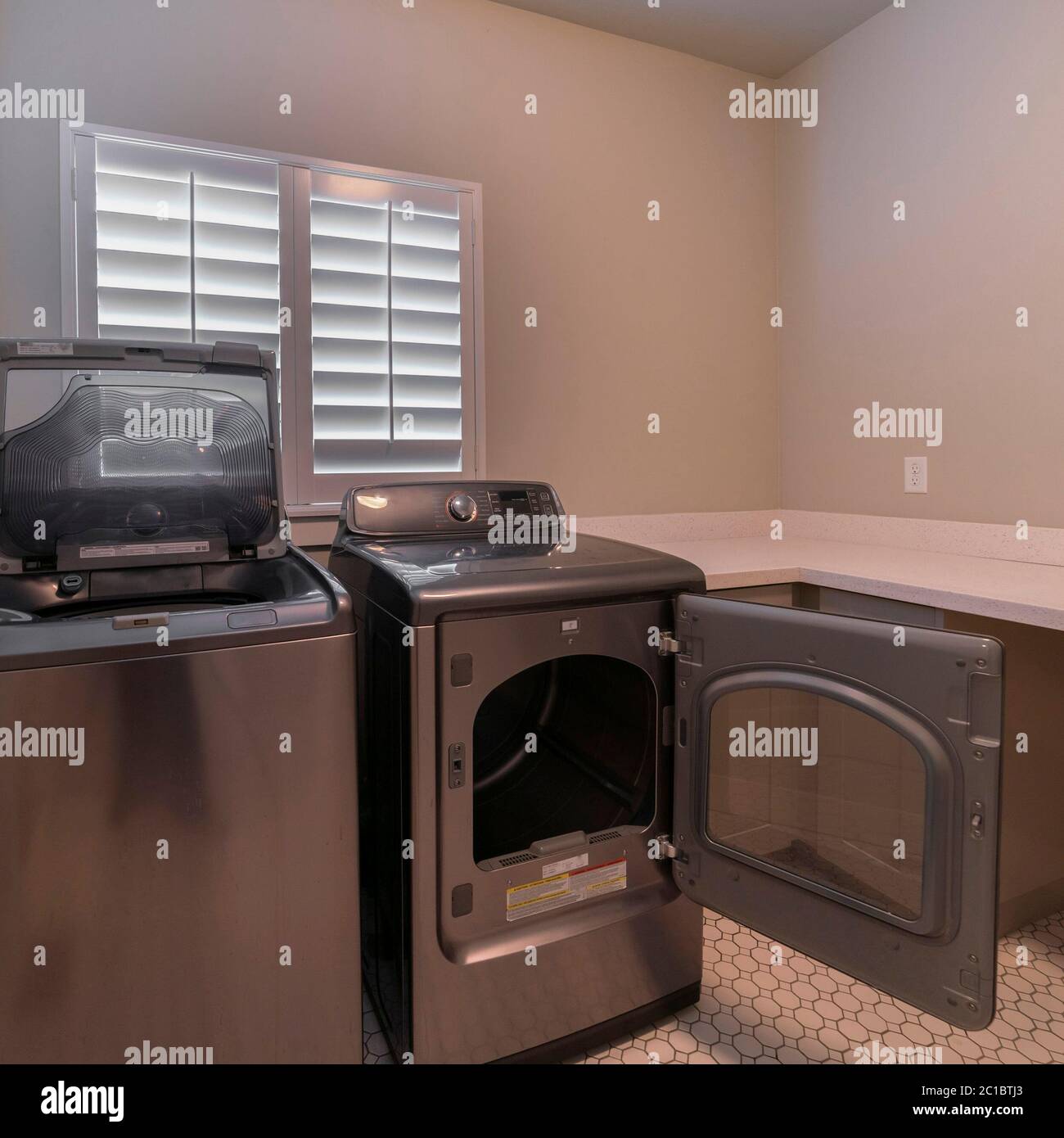 Square crop Electrical appliances in a laundry room interior Stock ...