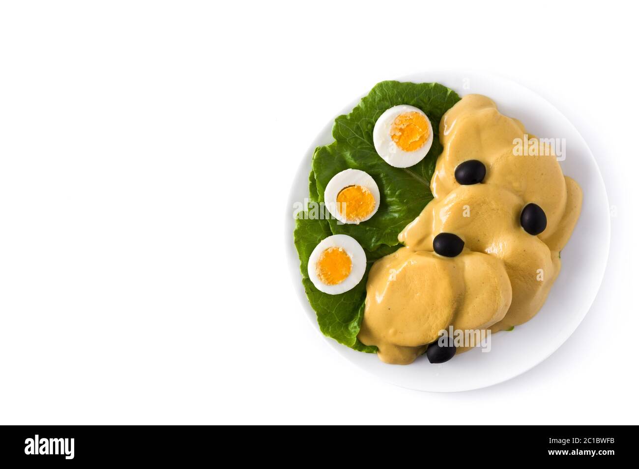 Traditional Peruvian papa a la huancaina isolated on white background ...