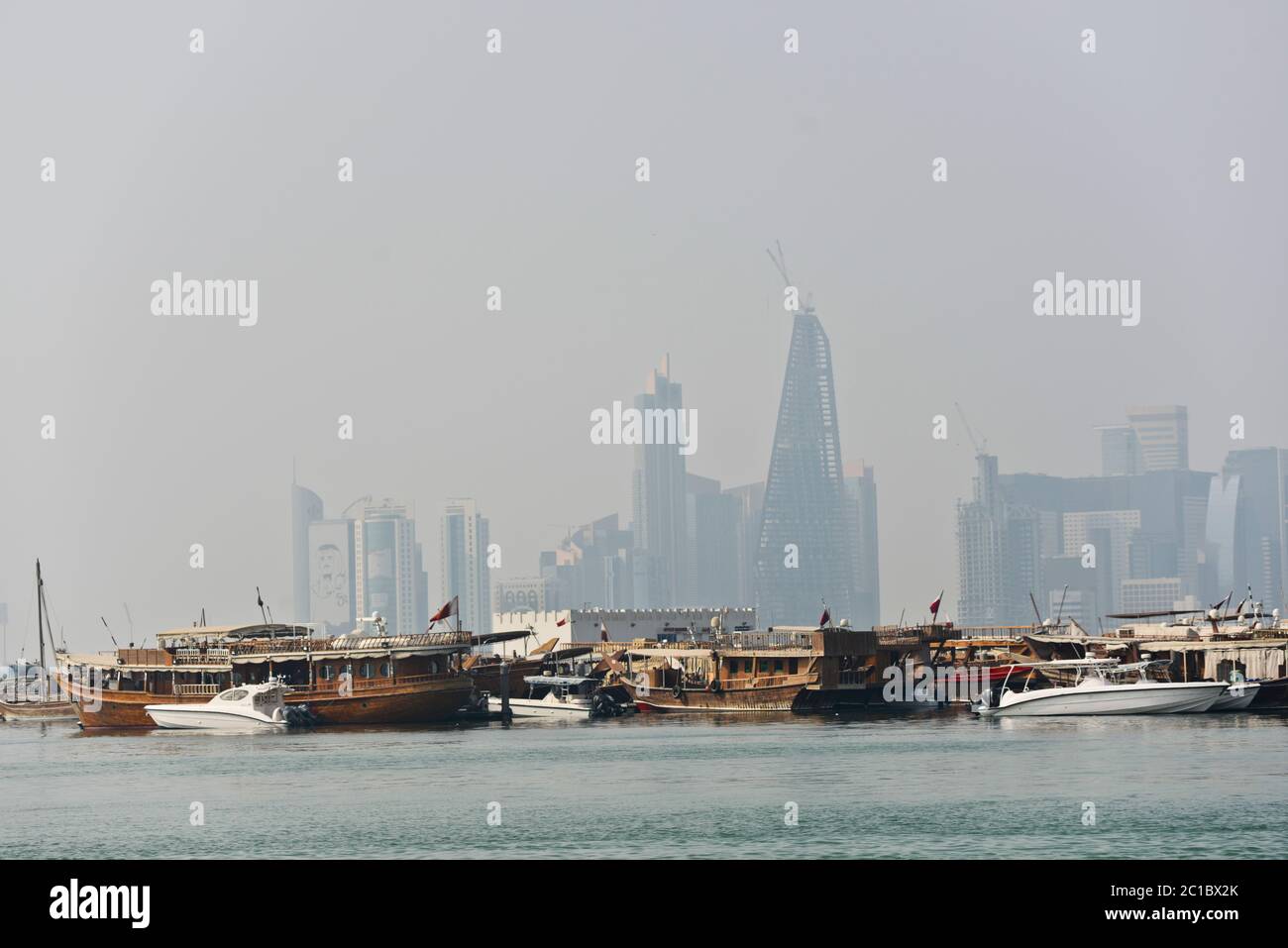 Dhow harbor with skyline in the background, Doha, Qatar Stock Photo - Alamy