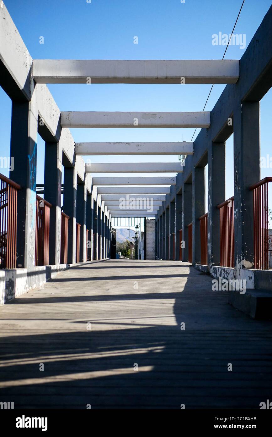 The view through the geometric and symmetrical bridge structure during ...