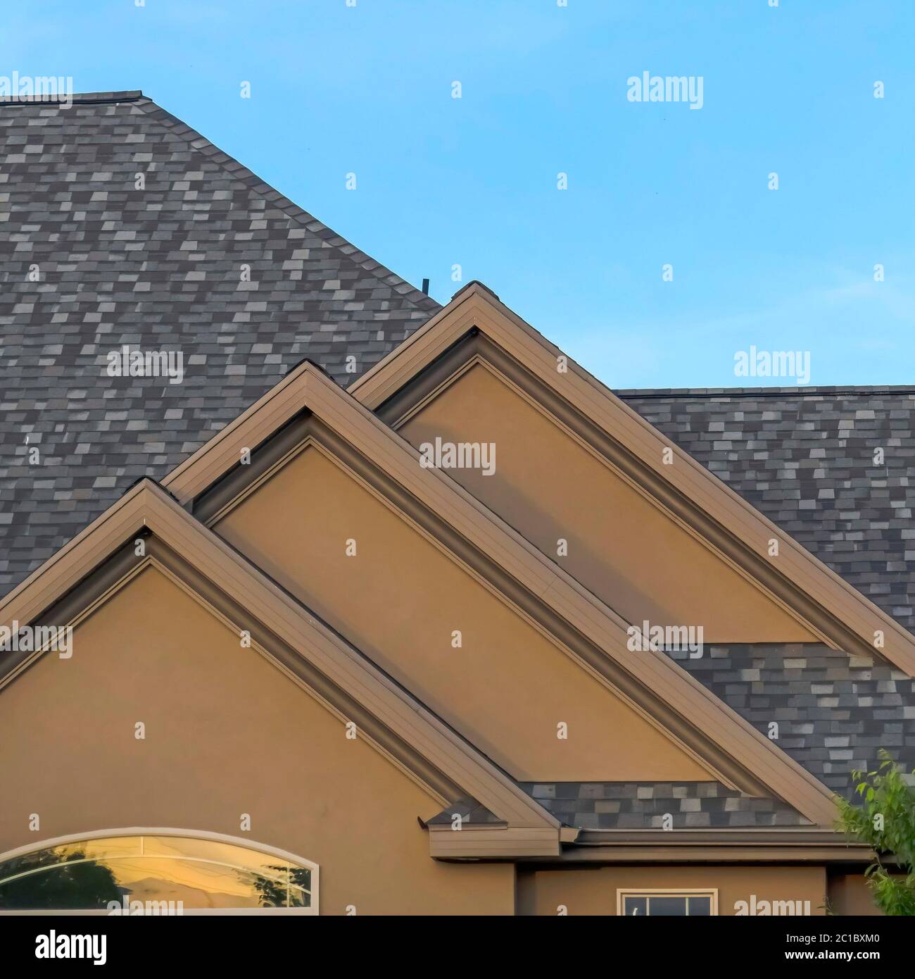 Square crop Home exterior with front gable roof and transom window ...