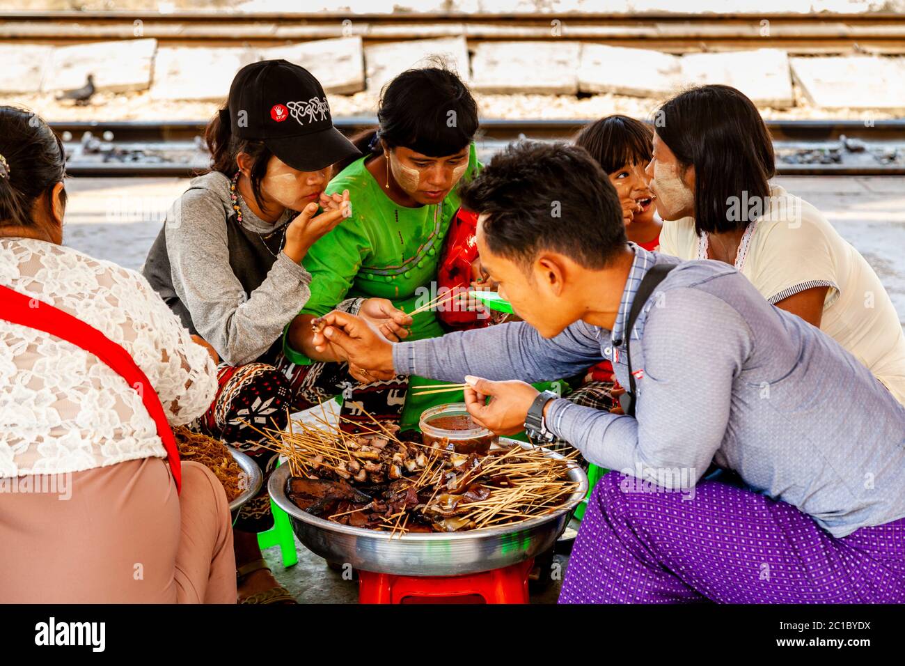 People Eating Snacks On The Platform At Yangon Central Railway Station ...