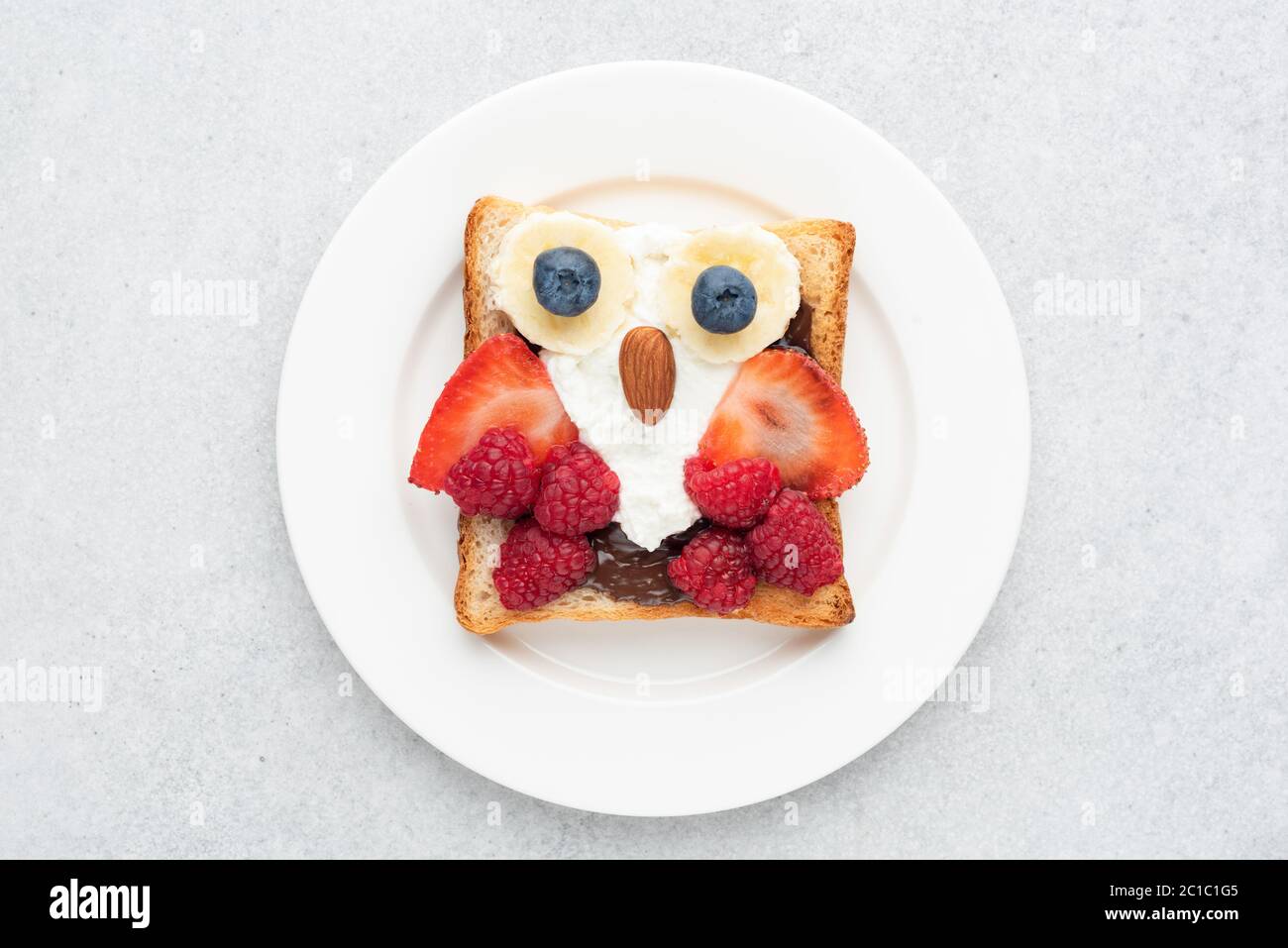 Food art breakfast owl toast for kids with chocolate nut spread, cream ...