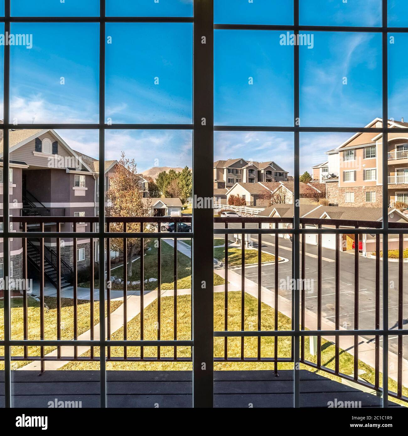 Square Through the window view of an urban street Stock Photo - Alamy