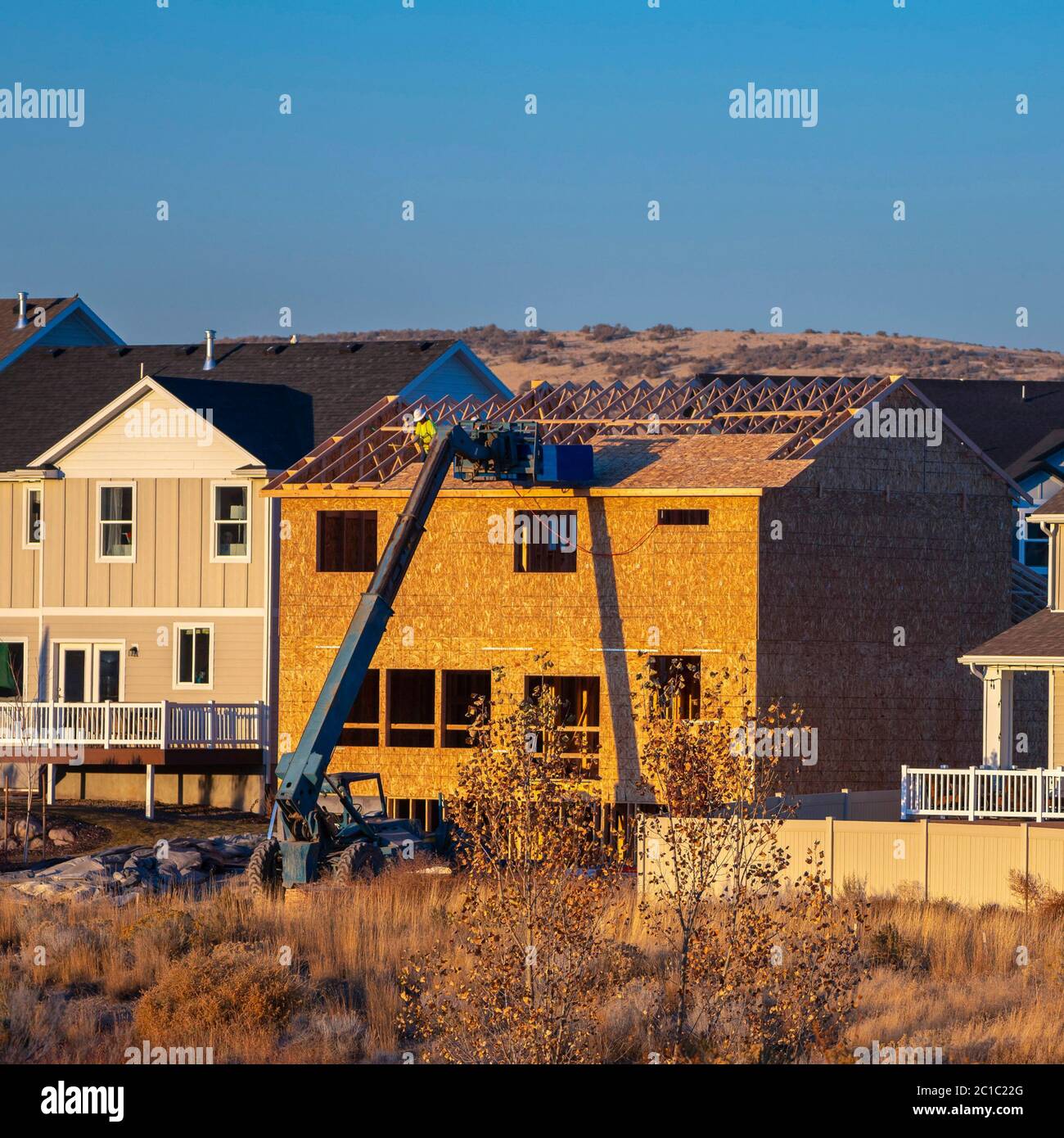 Square New homes in a modern housing development Stock Photo - Alamy