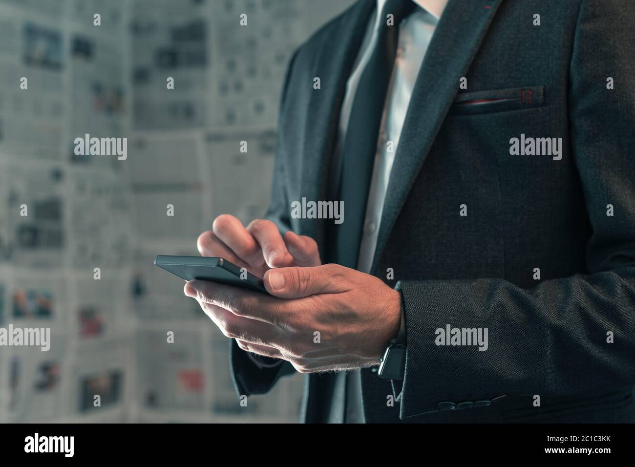 Businessman using mobile phone in fake news infodemic concept with ...