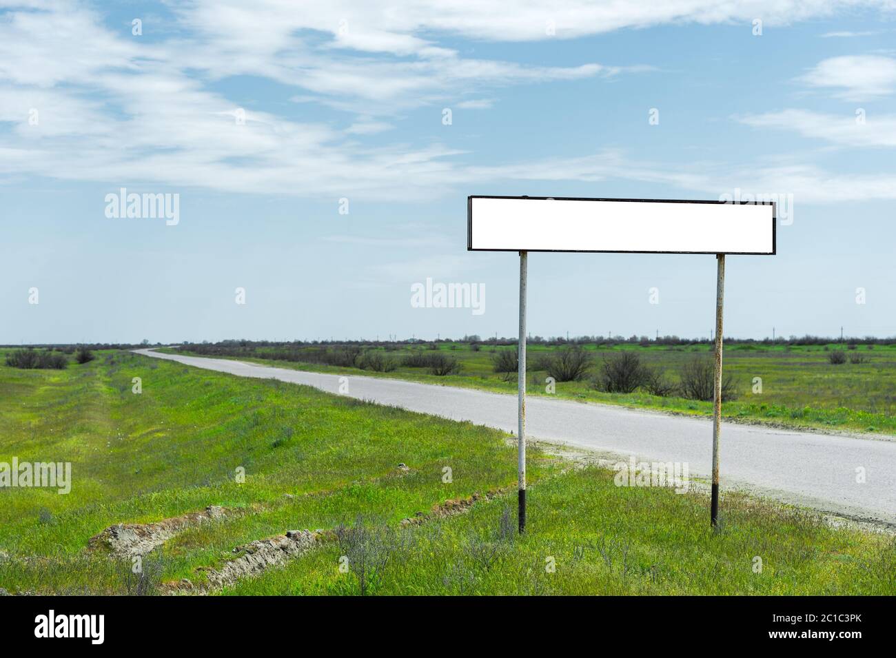 Empty old road sign for the name of a city or village populated area ...