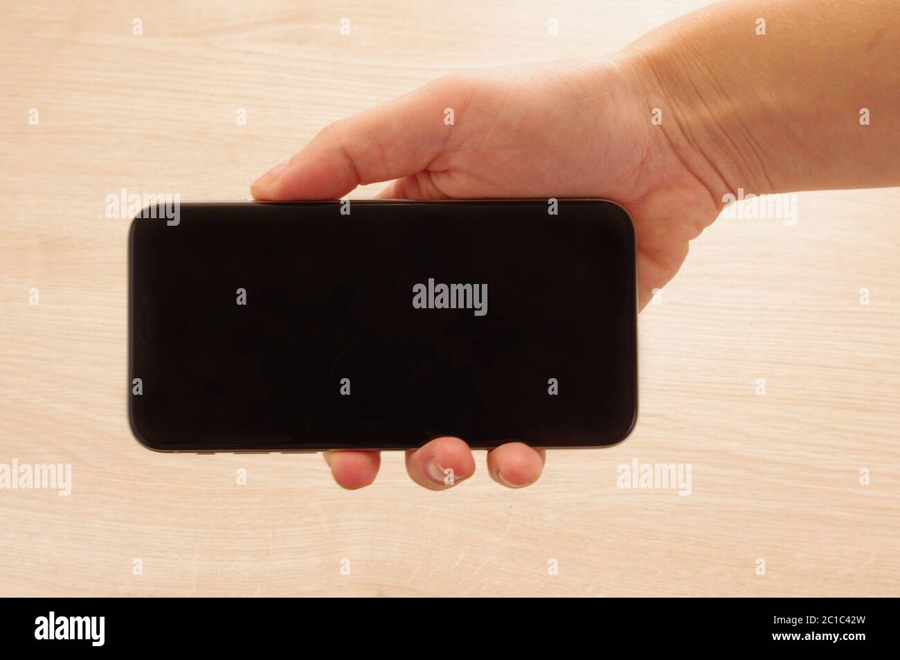 Iphone 11 in hand hi-res stock photography and images - Alamy