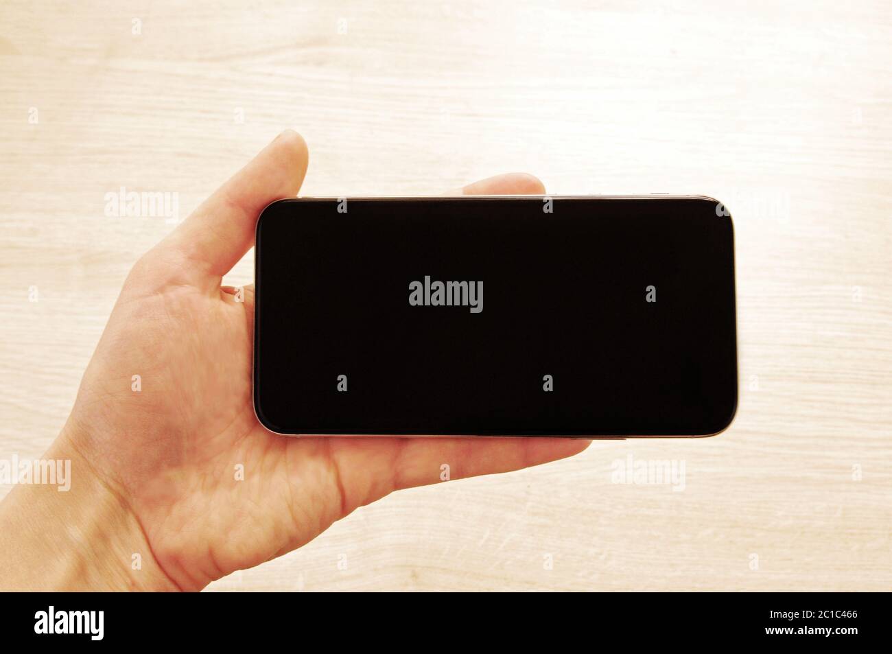 Iphone 11 in hand hi-res stock photography and images - Alamy