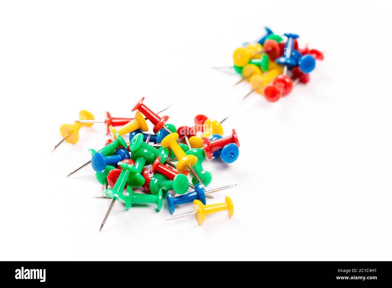 Group of push-pins, isolated on white Stock Photo - Alamy