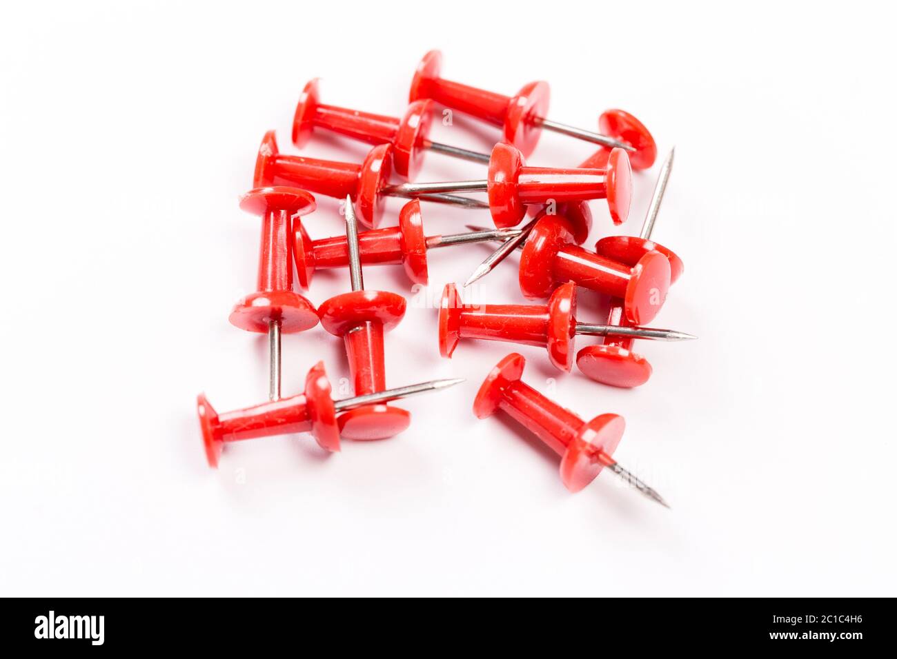 set of red push pins isolated on white background Stock Photo - Alamy