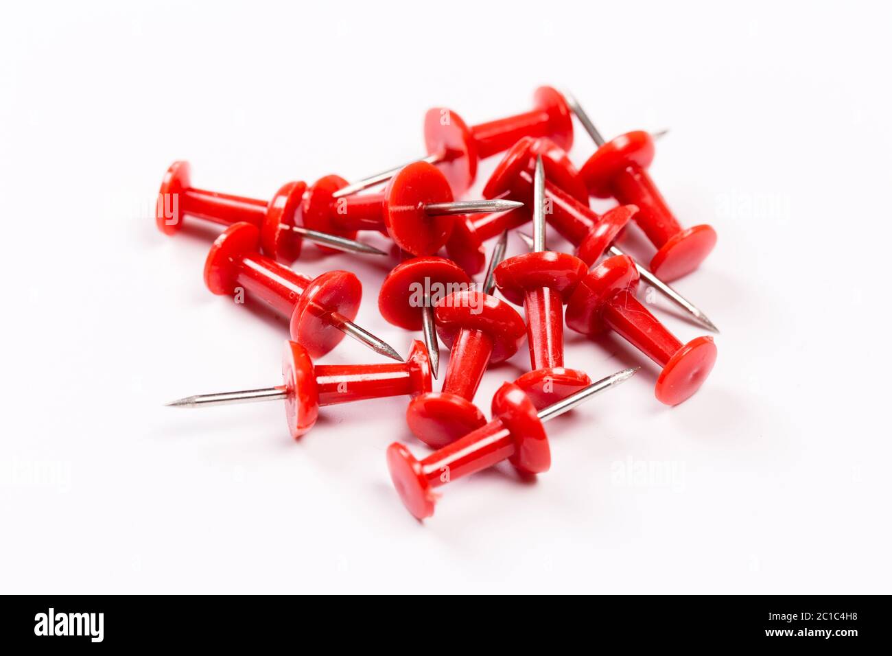 set of red push pins isolated on white background Stock Photo - Alamy