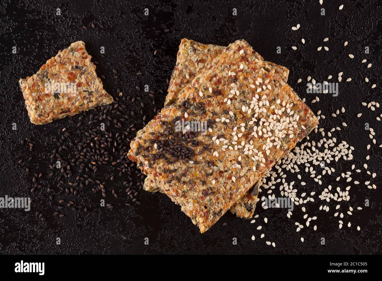 Crispy flatbread crackers with sesame and hemp seeds Stock Photo - Alamy