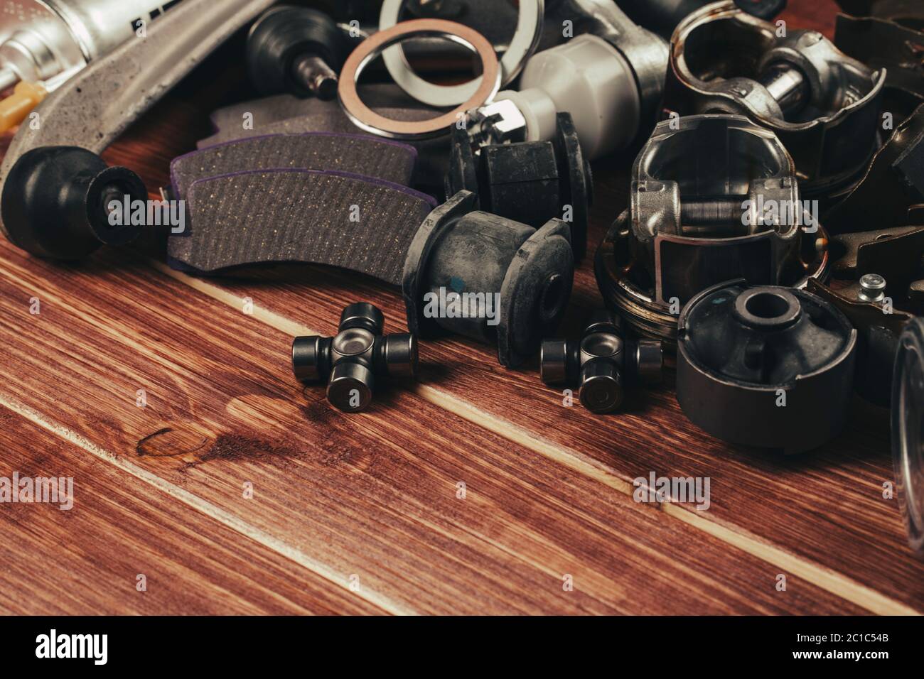 Various car parts on dark woooden background Stock Photo - Alamy
