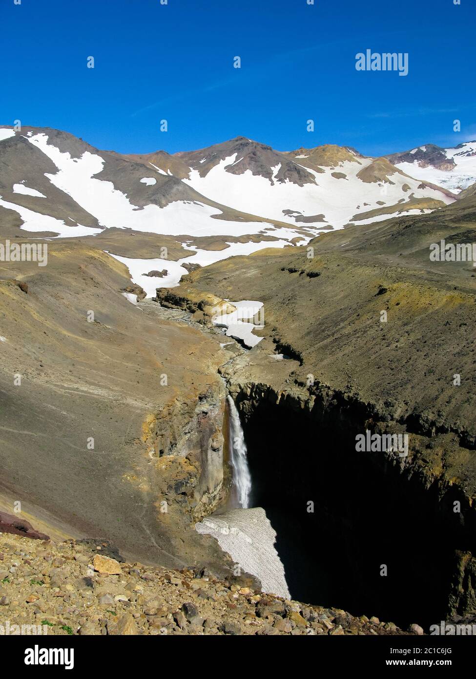 Panorama in active crater of Mutnovsky volcano with waterfall ...