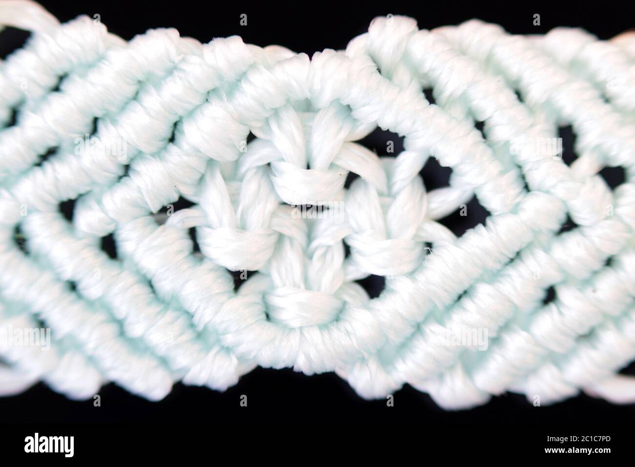 bracelet made by the technique of macrame. gently blue waxed thread ...