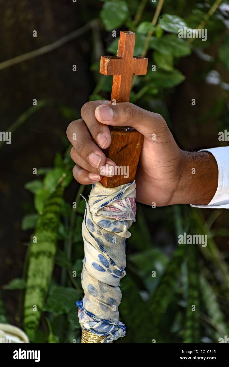 Hands with crucifix Stock Photo - Alamy