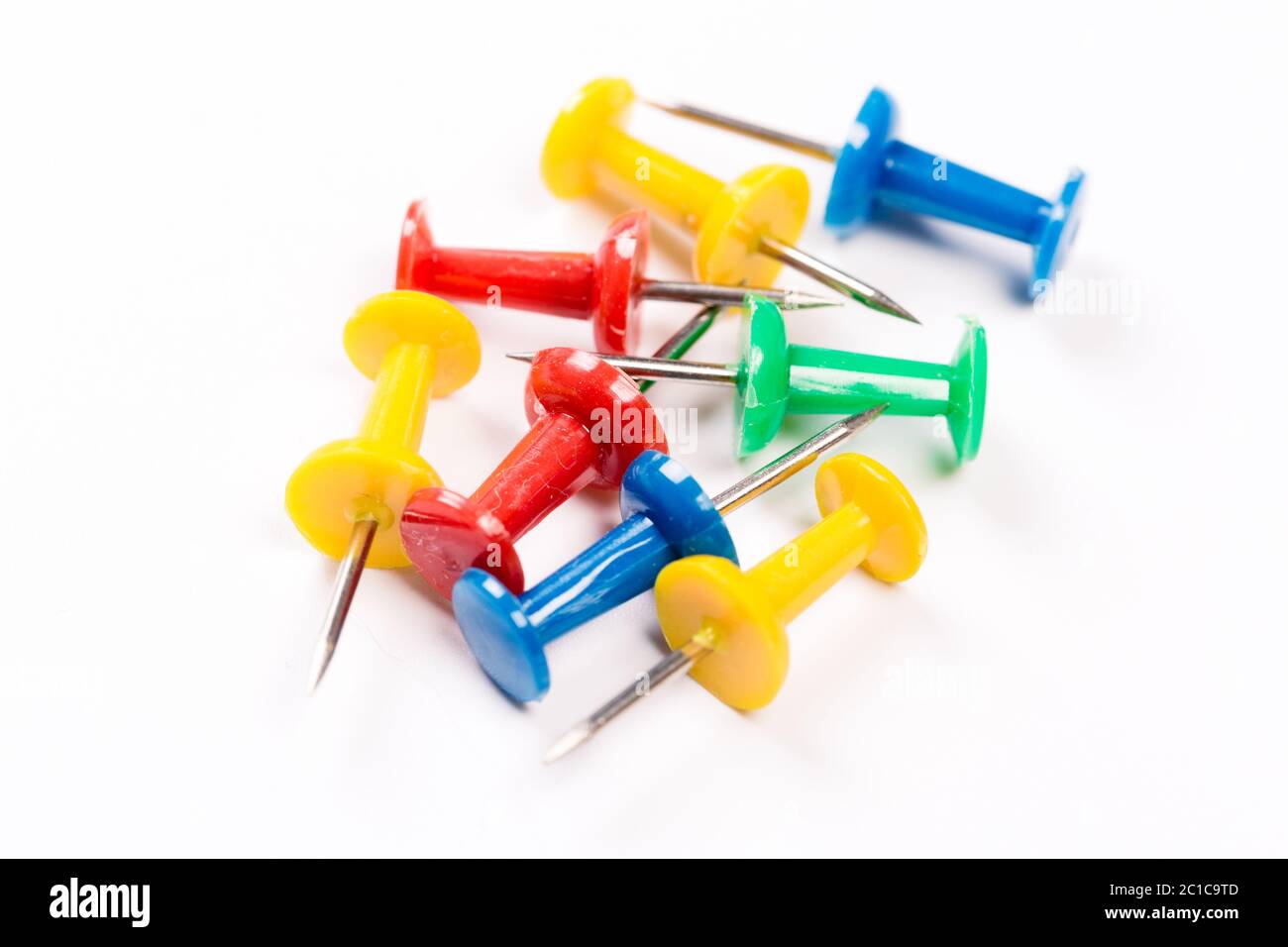 Group of push-pins, isolated on white Stock Photo - Alamy