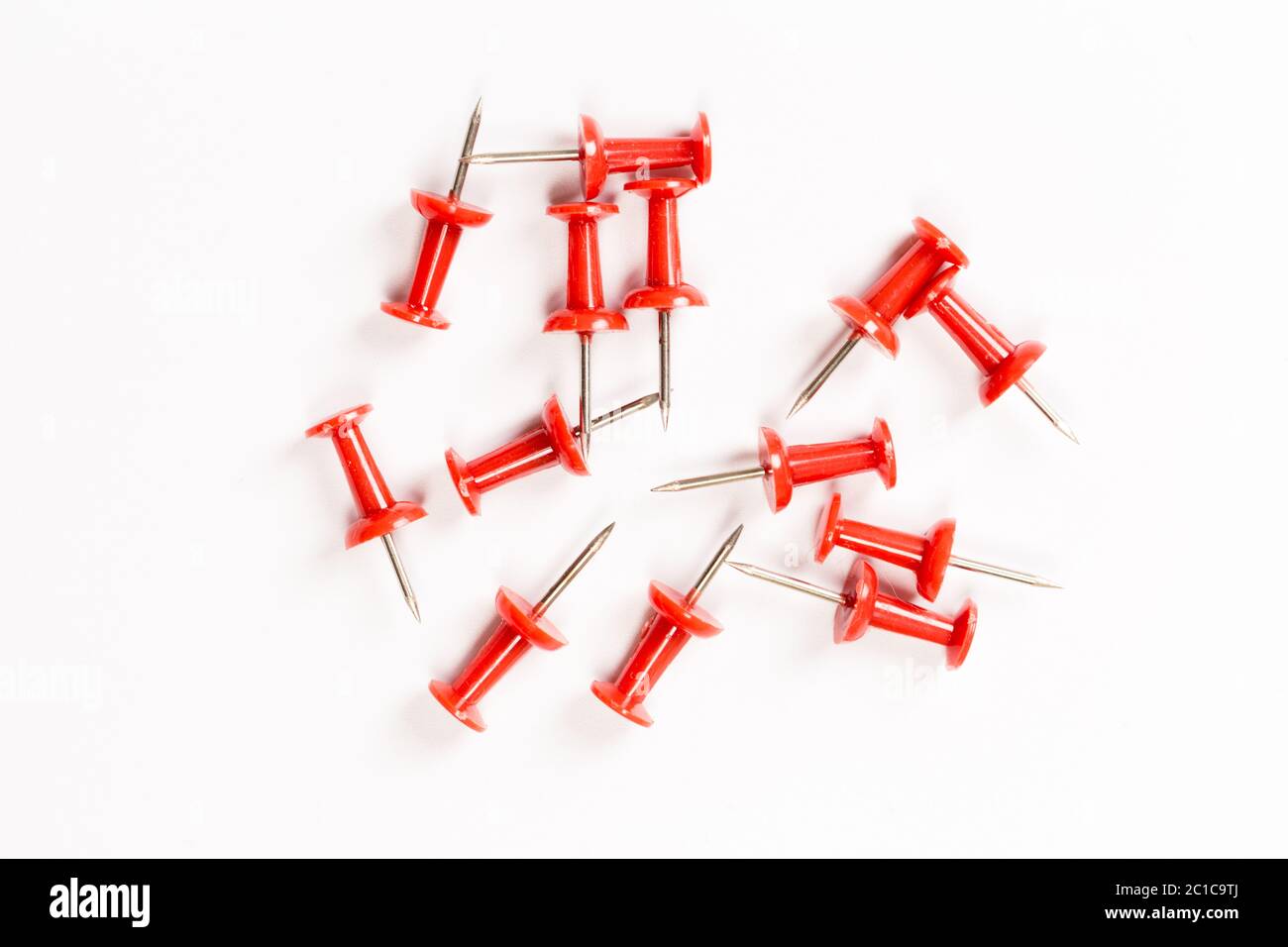 set of red push pins isolated on white background Stock Photo - Alamy
