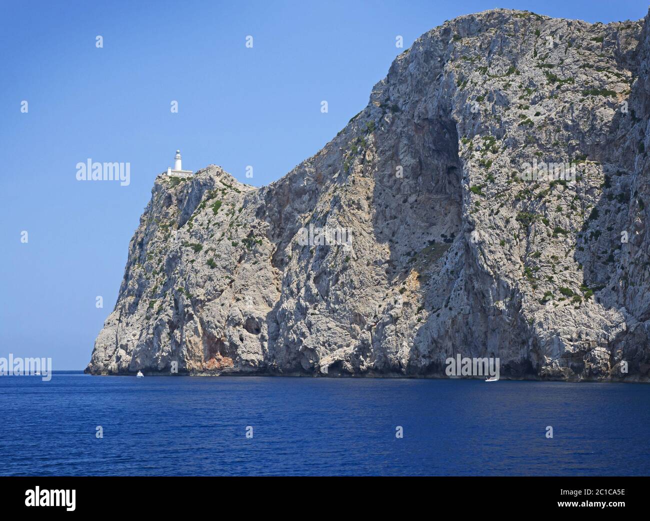 Lighthouse high up on the rock of Cape Formentor Stock Photo - Alamy