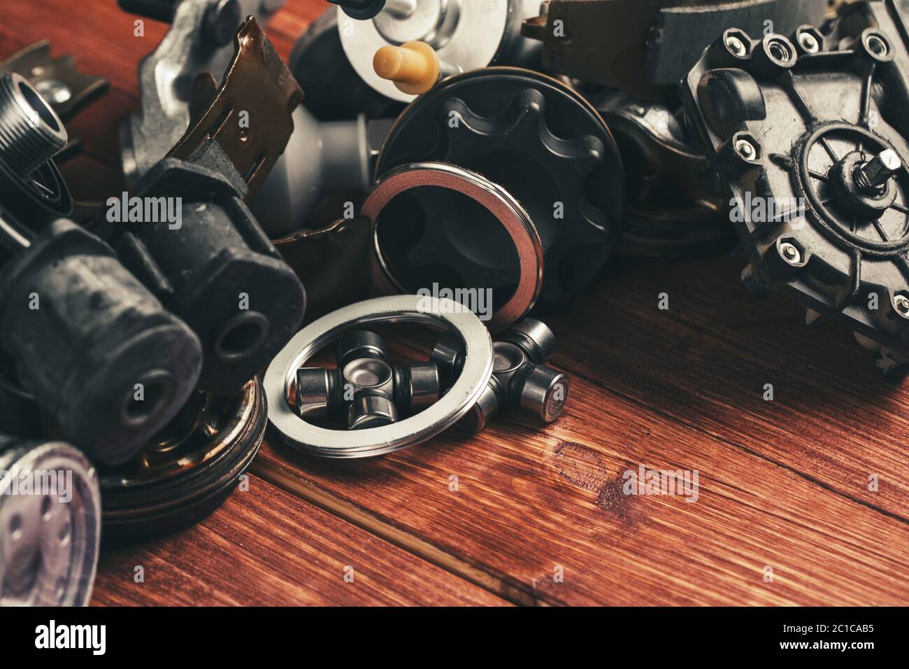 Various car parts on dark woooden background Stock Photo - Alamy