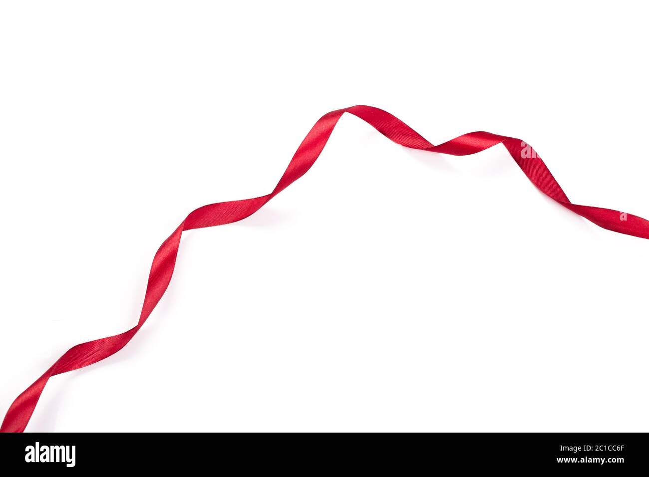 Red ribbon isolated on white background Stock Photo - Alamy