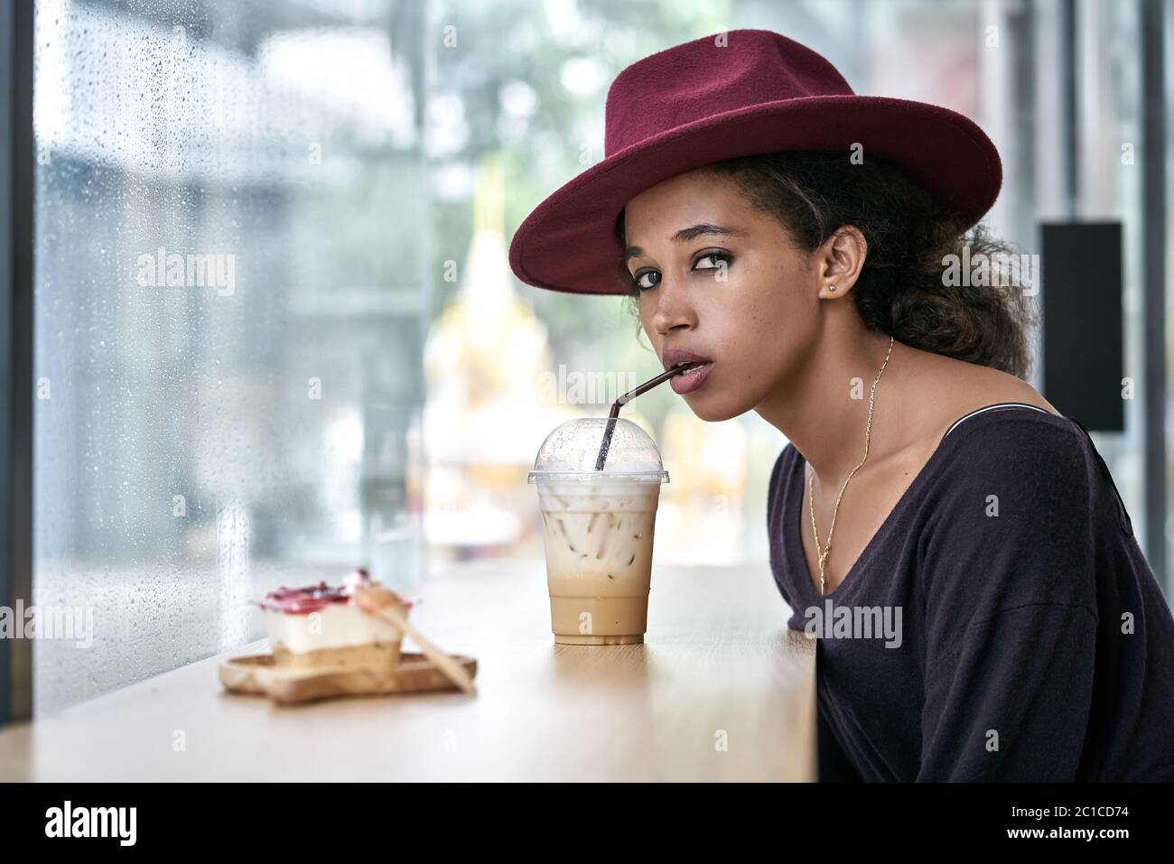 Beautiful girl in cafe Stock Photo - Alamy