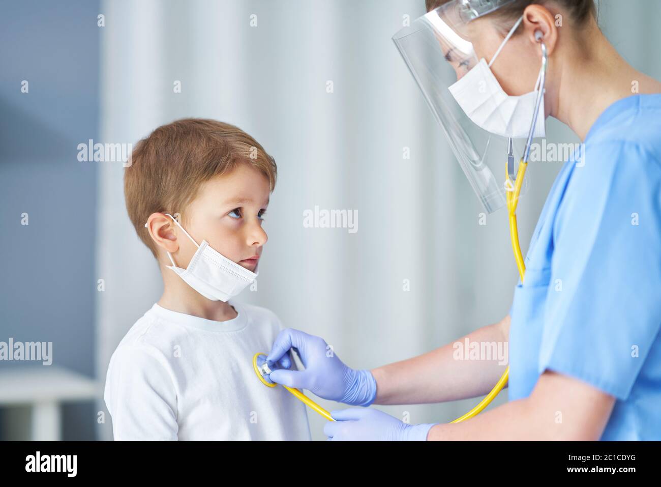 Portrait of adorable little boy having doctor's appointment Stock Photo ...