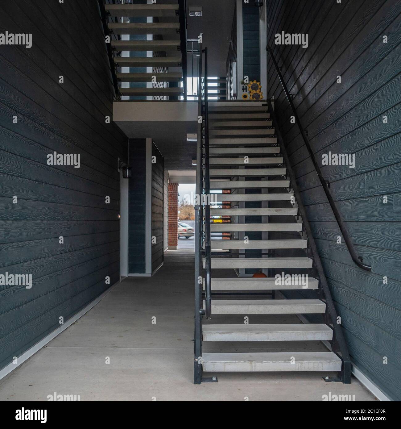 Square Internal stairs from a ground floor foyer Stock Photo - Alamy