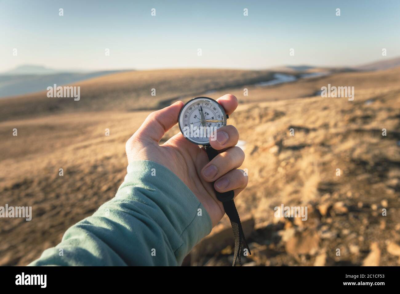 Compass in Hand Natural background .Vintage Tone Stock Photo - Alamy