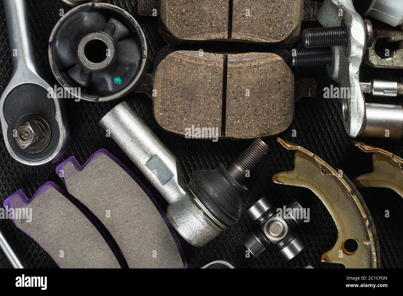 Various Car parts on dark background Stock Photo - Alamy