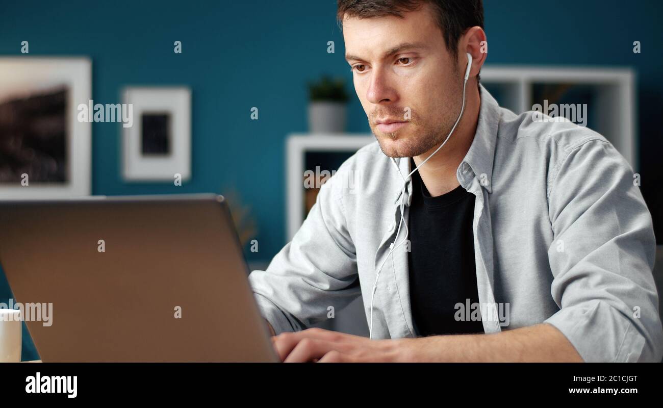 Focused young man hi-res stock photography and images - Alamy