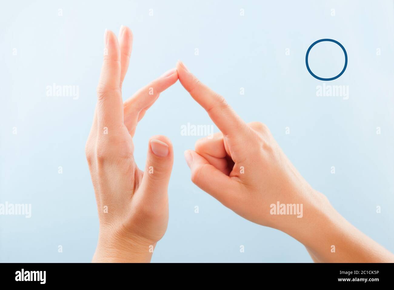 BSL Fingerspelling alphabet O Stock Photo - Alamy
